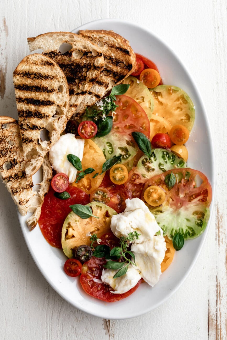Caprese Salad with Sliced Tomato, Mozzarella and Basil