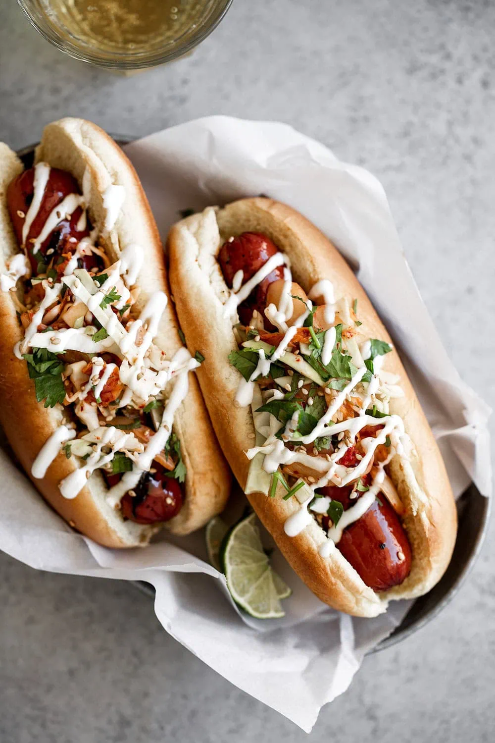 Soy Glazed Korean-Inspired Kimchi Hot Dogs - Cooking with Cocktail Rings