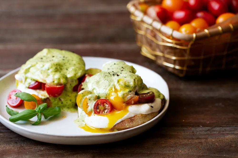 Caprese Eggs Benedict with Basil Hollandaise - Cooking with Cocktail Rings