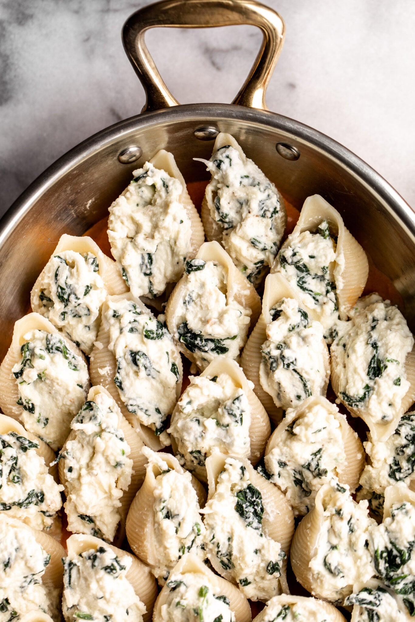 Baked Stuffed Shells in Vodka Sauce, Pesto Oil and Smoked Mozzarella