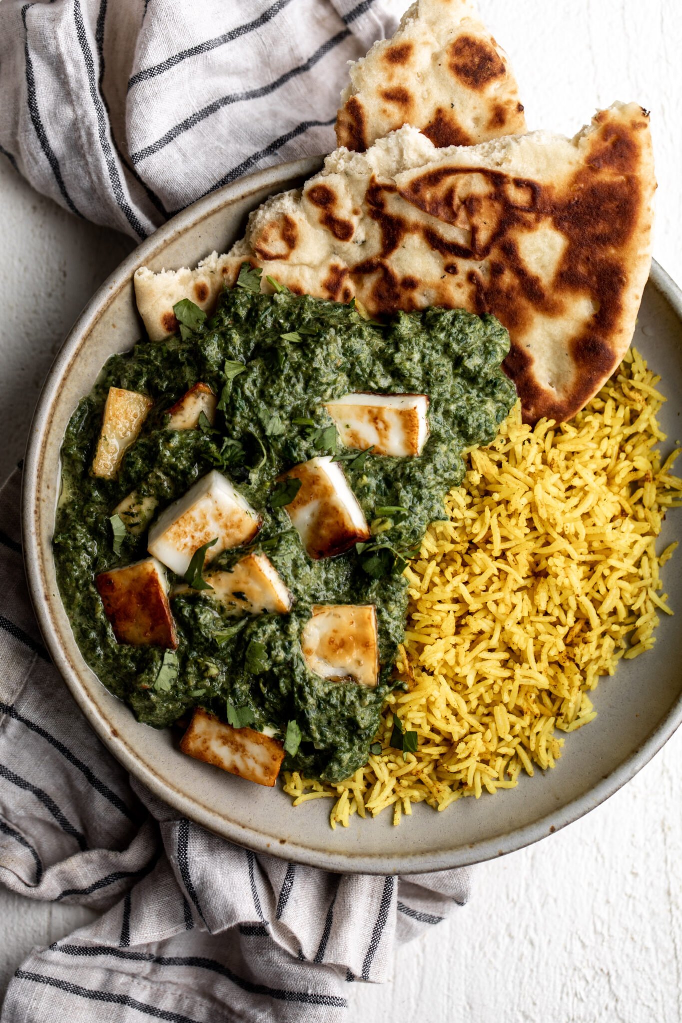 Saag Paneer over Turmeric Rice - Cooking with Cocktail Rings