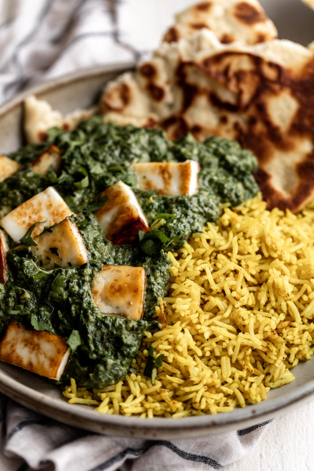 Saag Paneer over Turmeric Rice - Cooking with Cocktail Rings