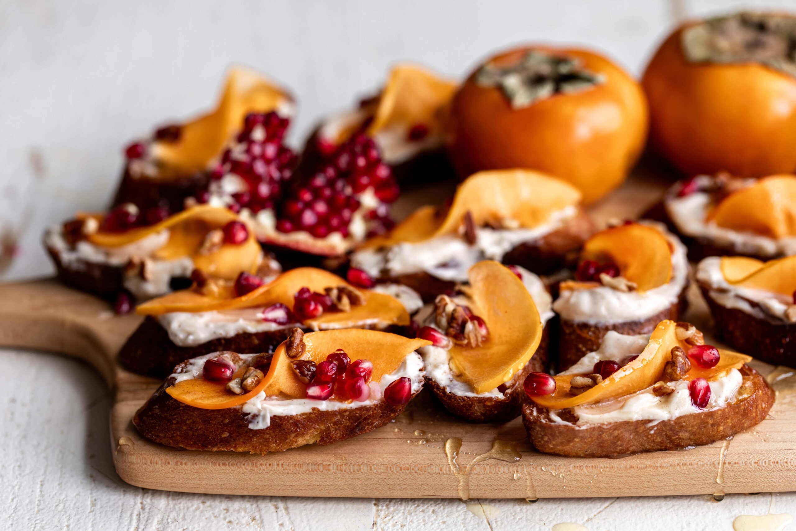 Spiced Honey Persimmon Toasts - Cooking with Cocktail Rings