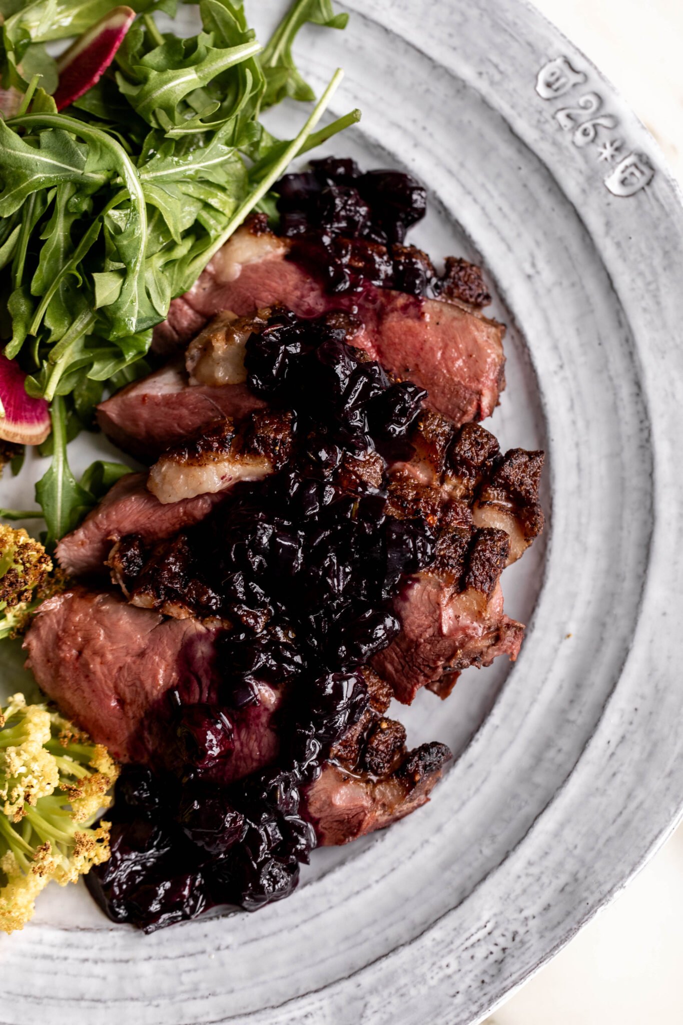 Seared Duck Breast with Blueberry Pan Sauce - Cooking with Cocktail Rings