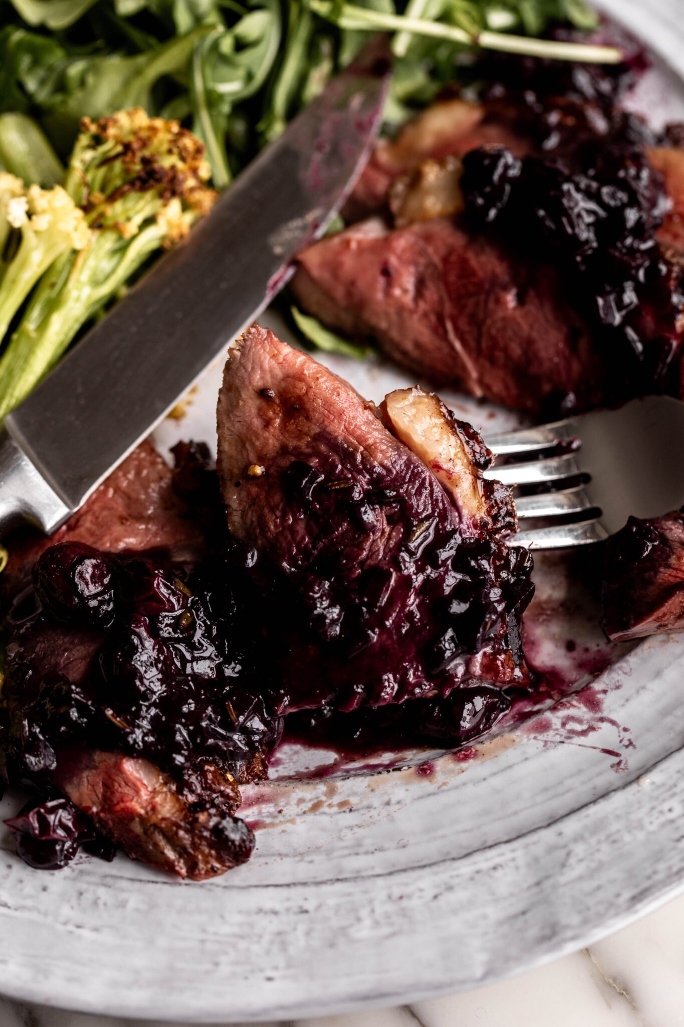 Seared Duck Breast with Blueberry Pan Sauce - Cooking with Cocktail Rings